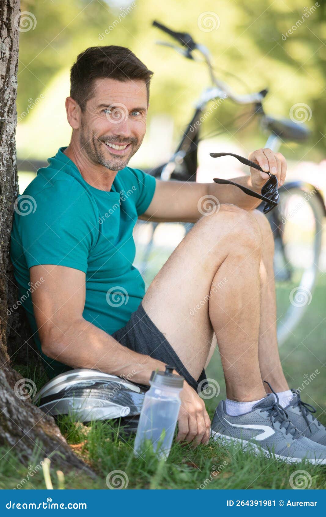 Cyclist having break stock image. Image of outfit, glove - 264391981