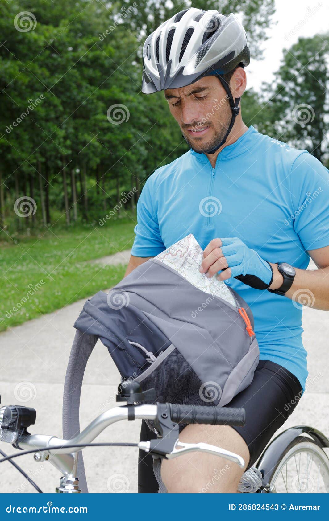 Cyclist Man Checking Map and Looking Around Stock Image - Image of ...