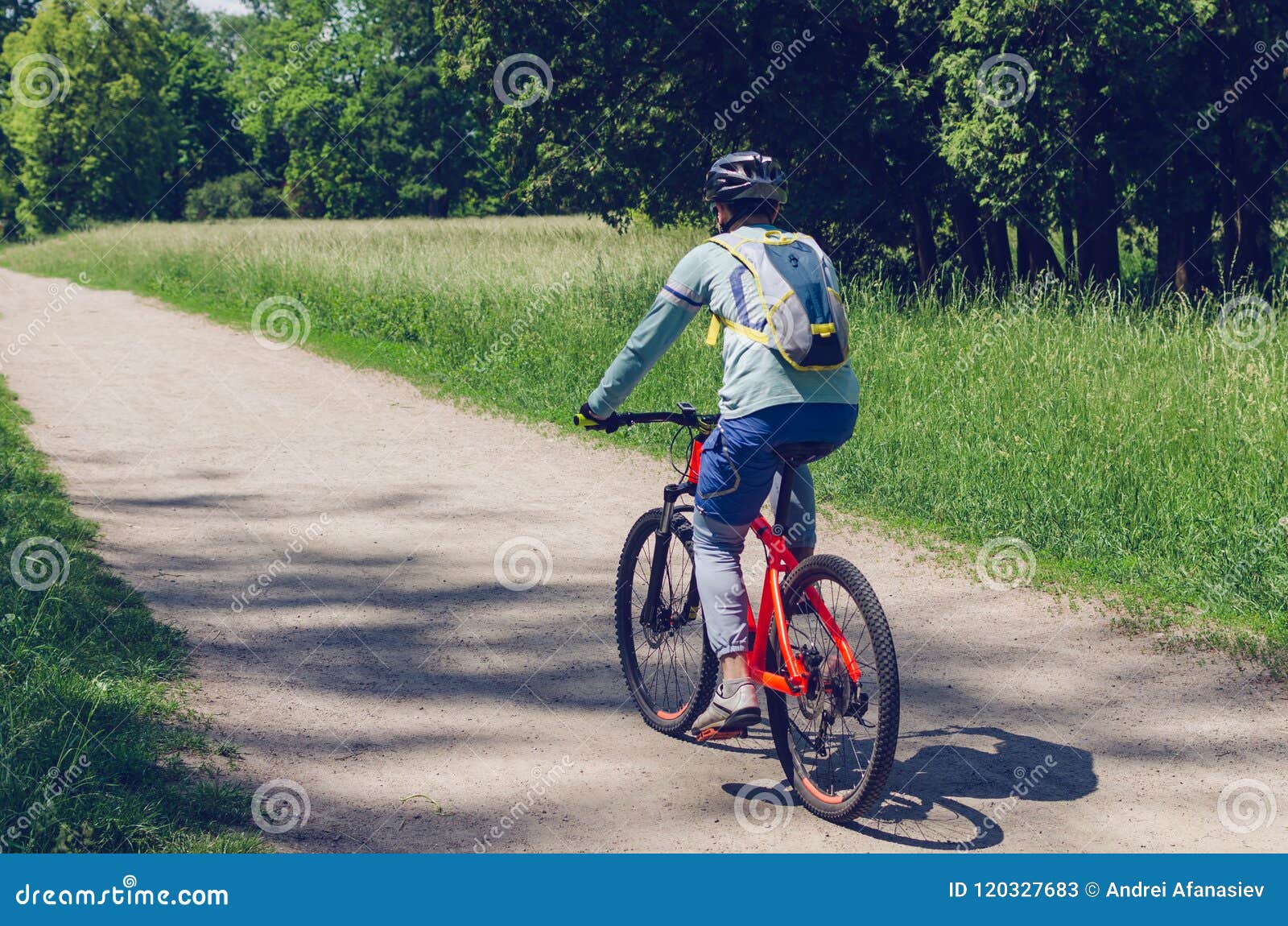The Cyclist in Motion Riding Bicycle Road Stock Image - Image of ...