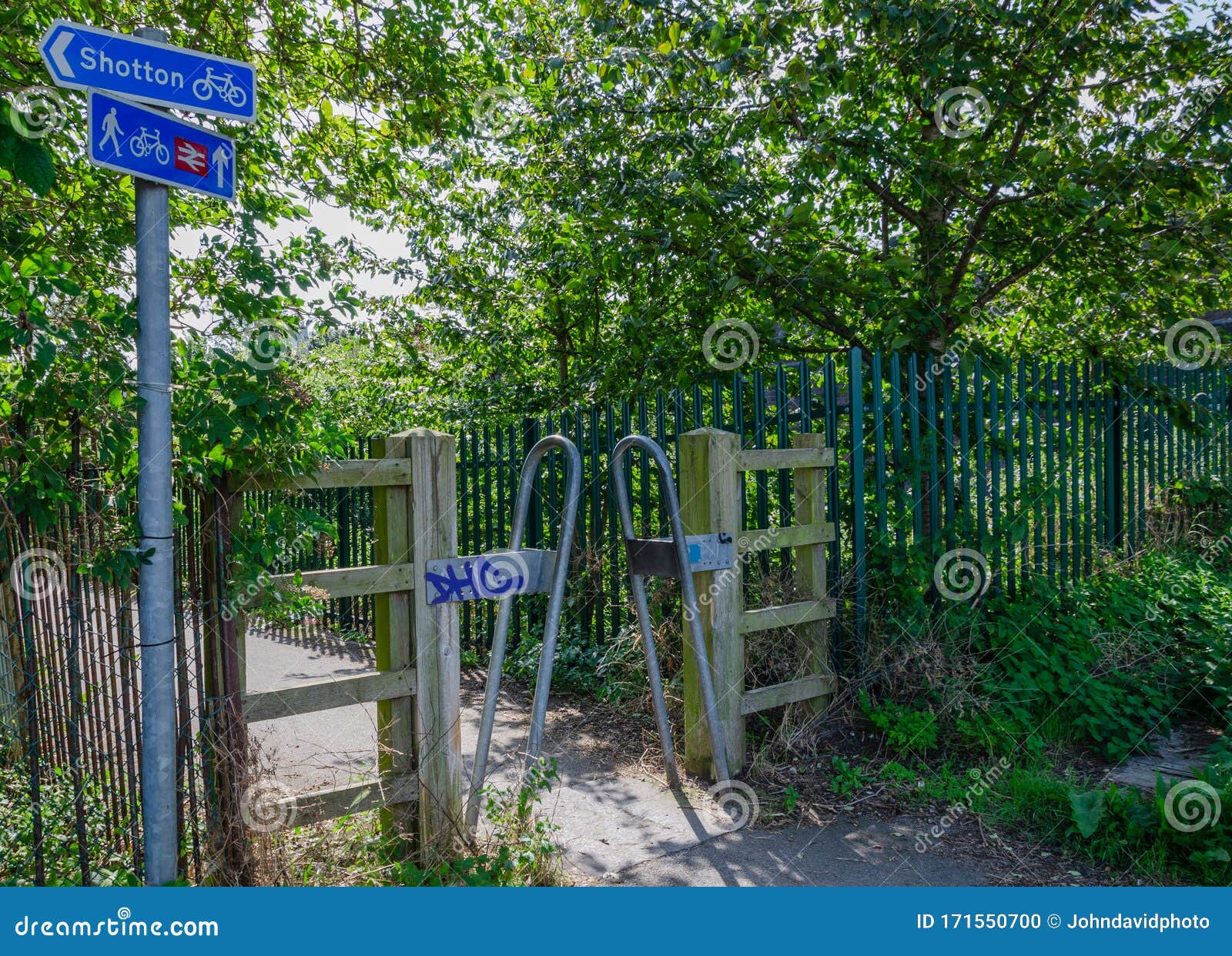Cyclist and Pedestrian Signs Next To a Width Restrictor Stock Photo ...