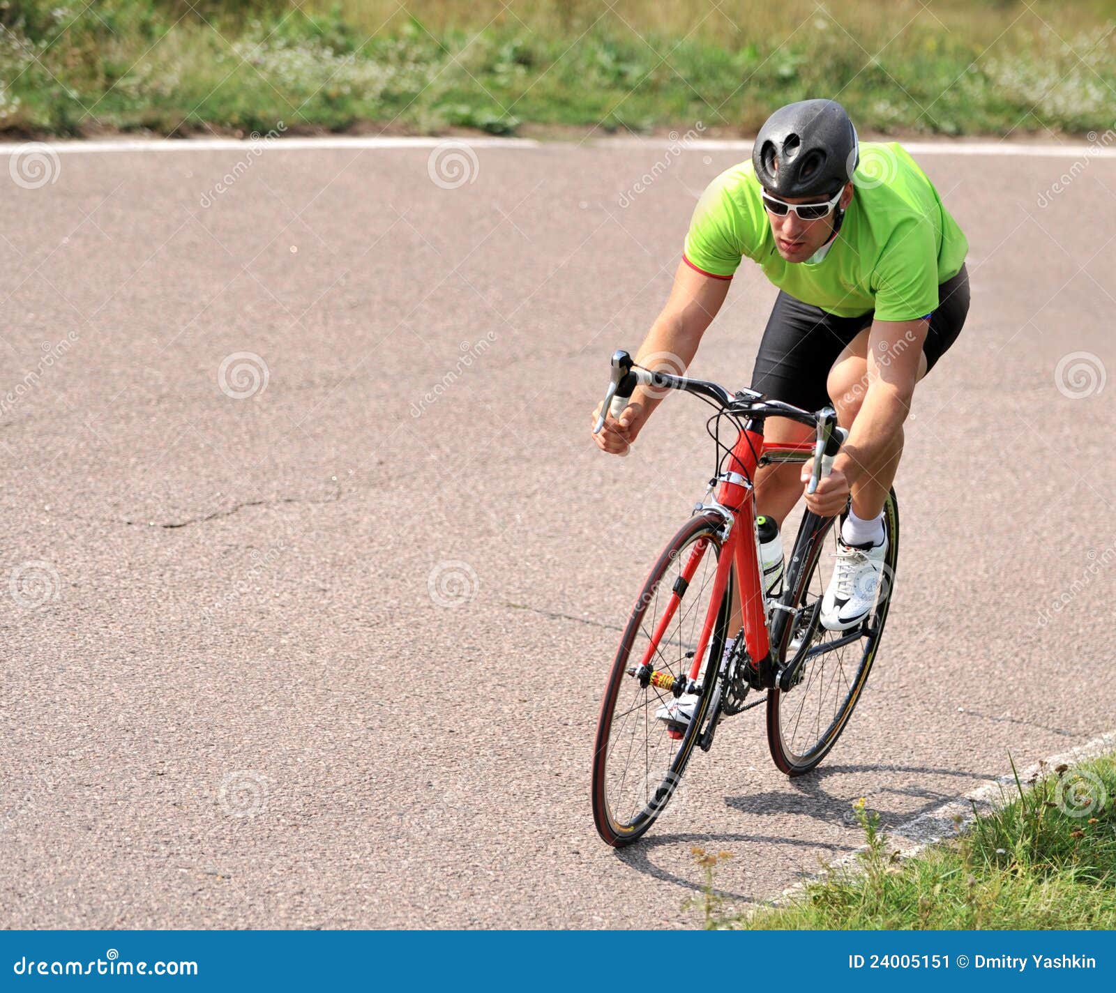 Cyclist riding a bicycle stock image. Image of acceleration - 24005151