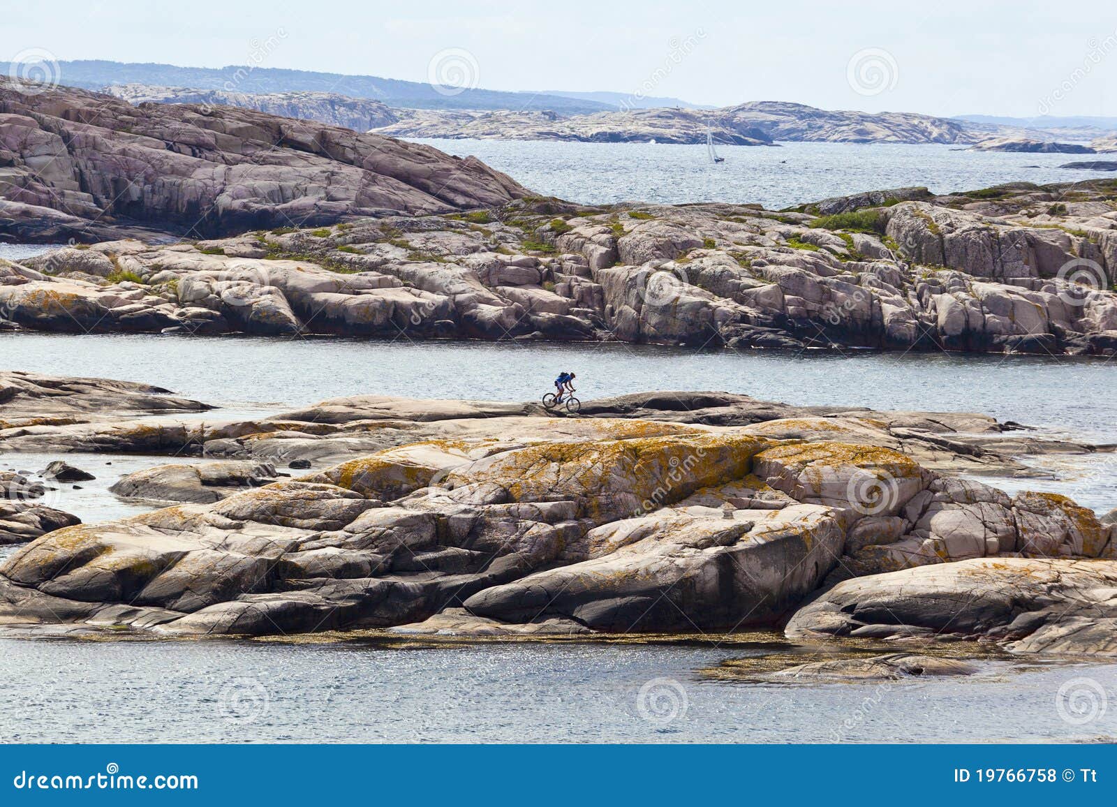 Cyclist on the rocks stock photo. Image of cliff, cyclists - 19766758