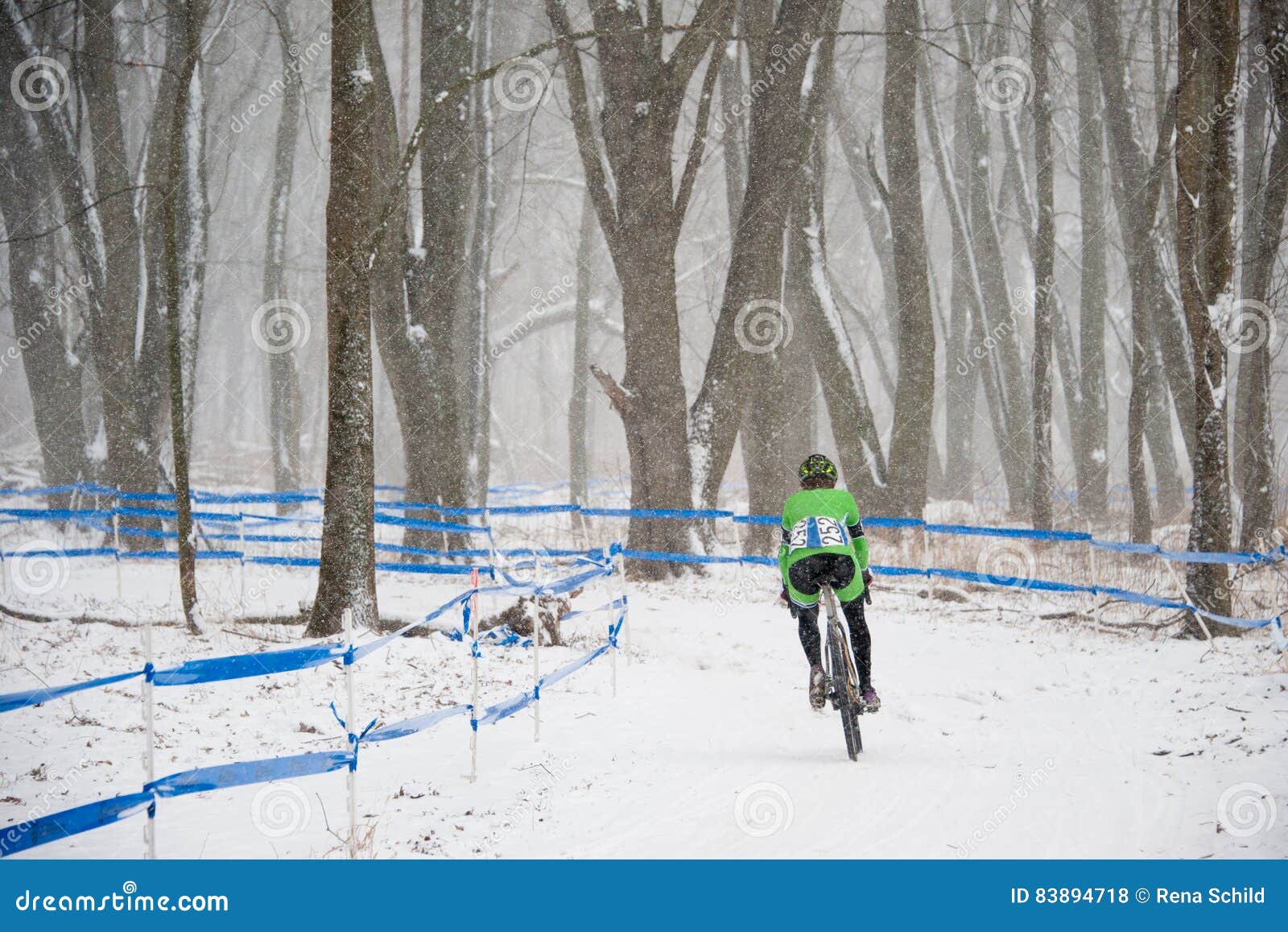 Cyclist in Snow stock photo. Image of snow, cyclist, cold - 83894718
