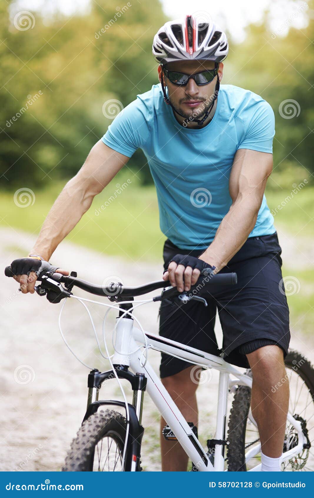Cyclist in the summer stock photo. Image of focus, bicycle - 58702128