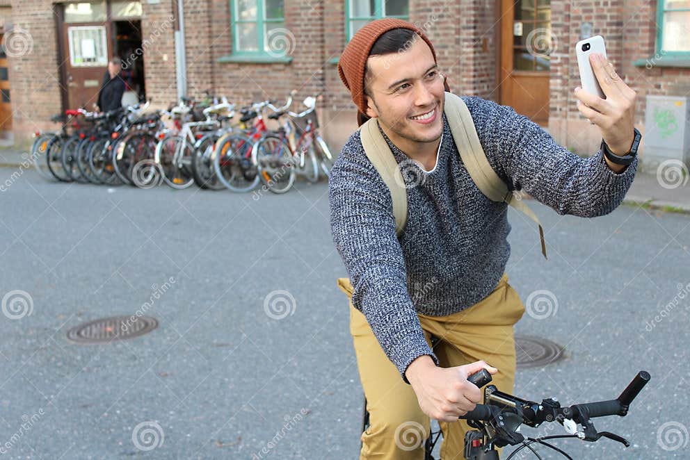 Cyclist Taking a Selfie while Riding Stock Photo - Image of bike, latin ...