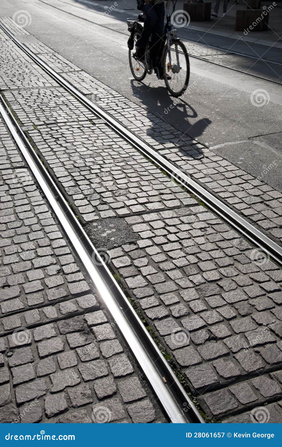 Cyclist on Tram Track stock image. Image of bicycle, cycle - 28061657