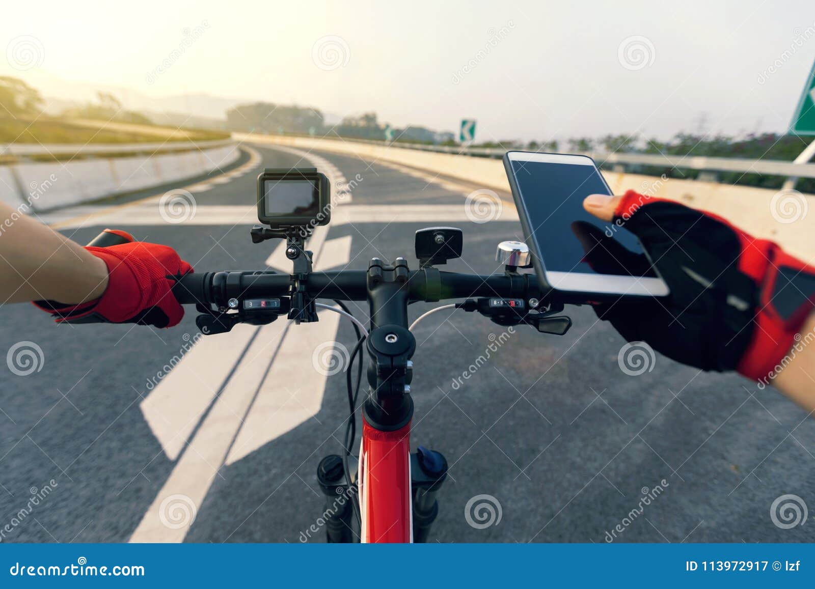 Cyclist Using Smartphone for Navigation Stock Image - Image of morning ...