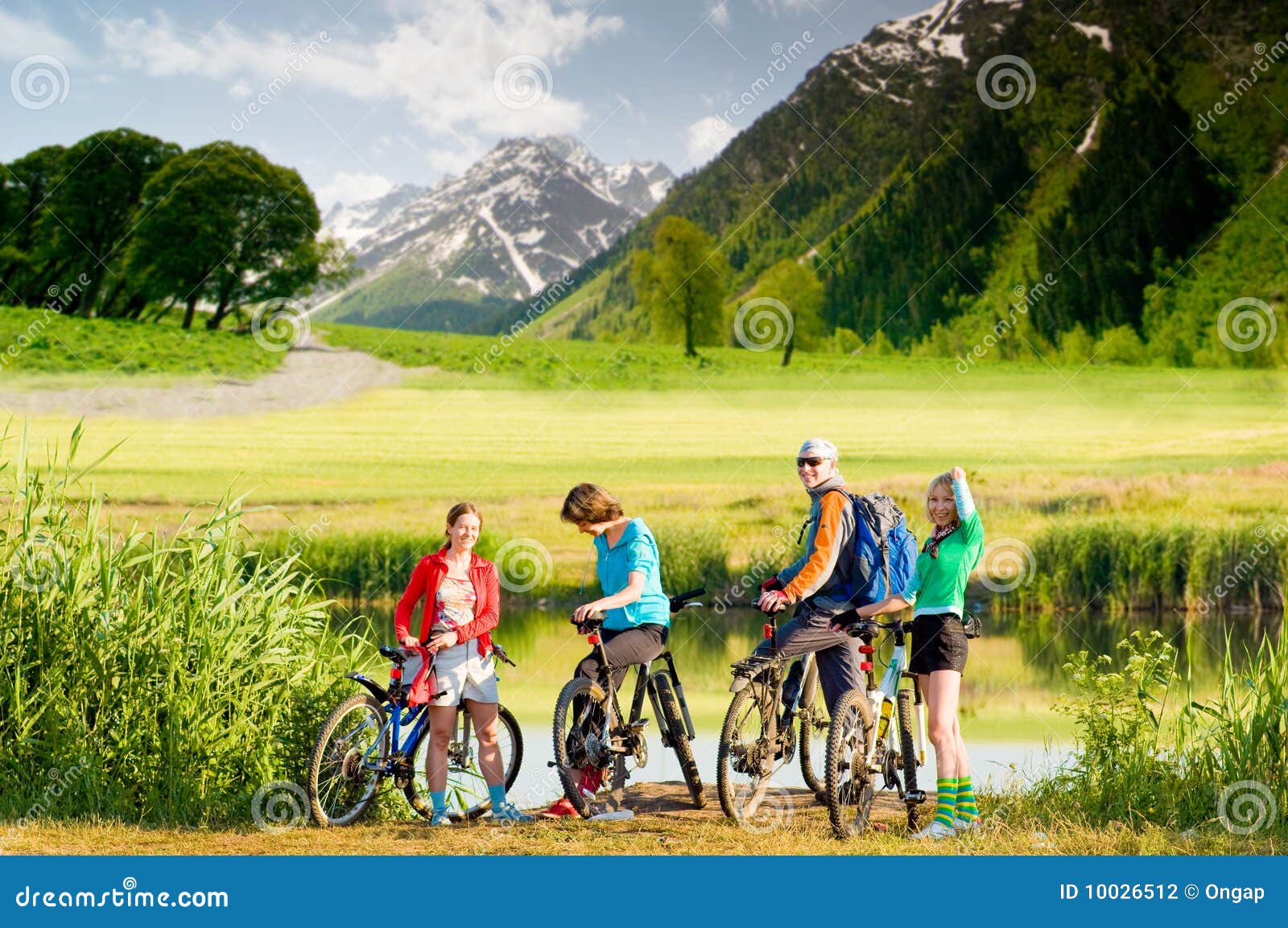 Cyclists biking outdoors stock photo. Image of adult - 10026512