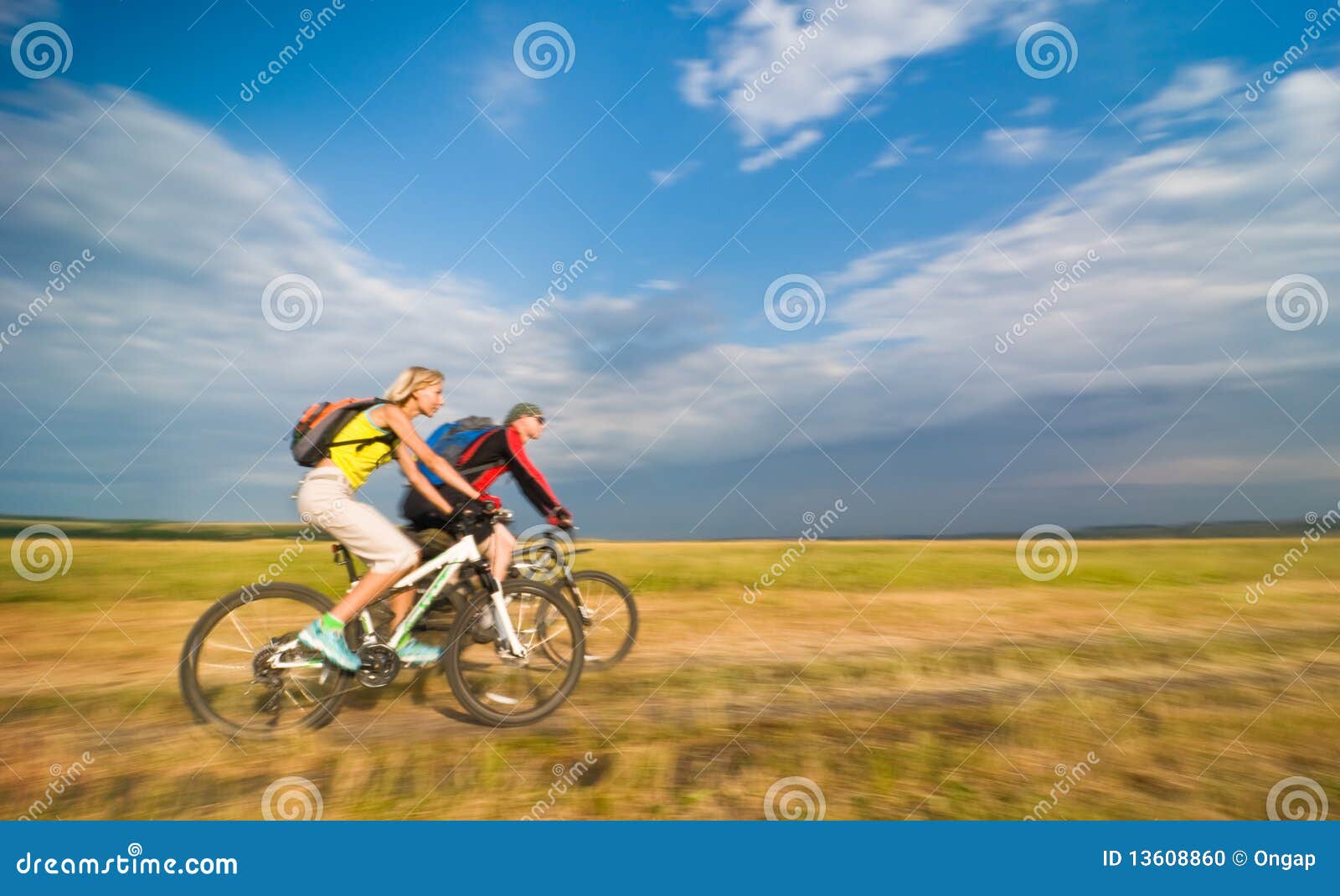 Cyclists in motion stock photo. Image of happy, biking - 13608860