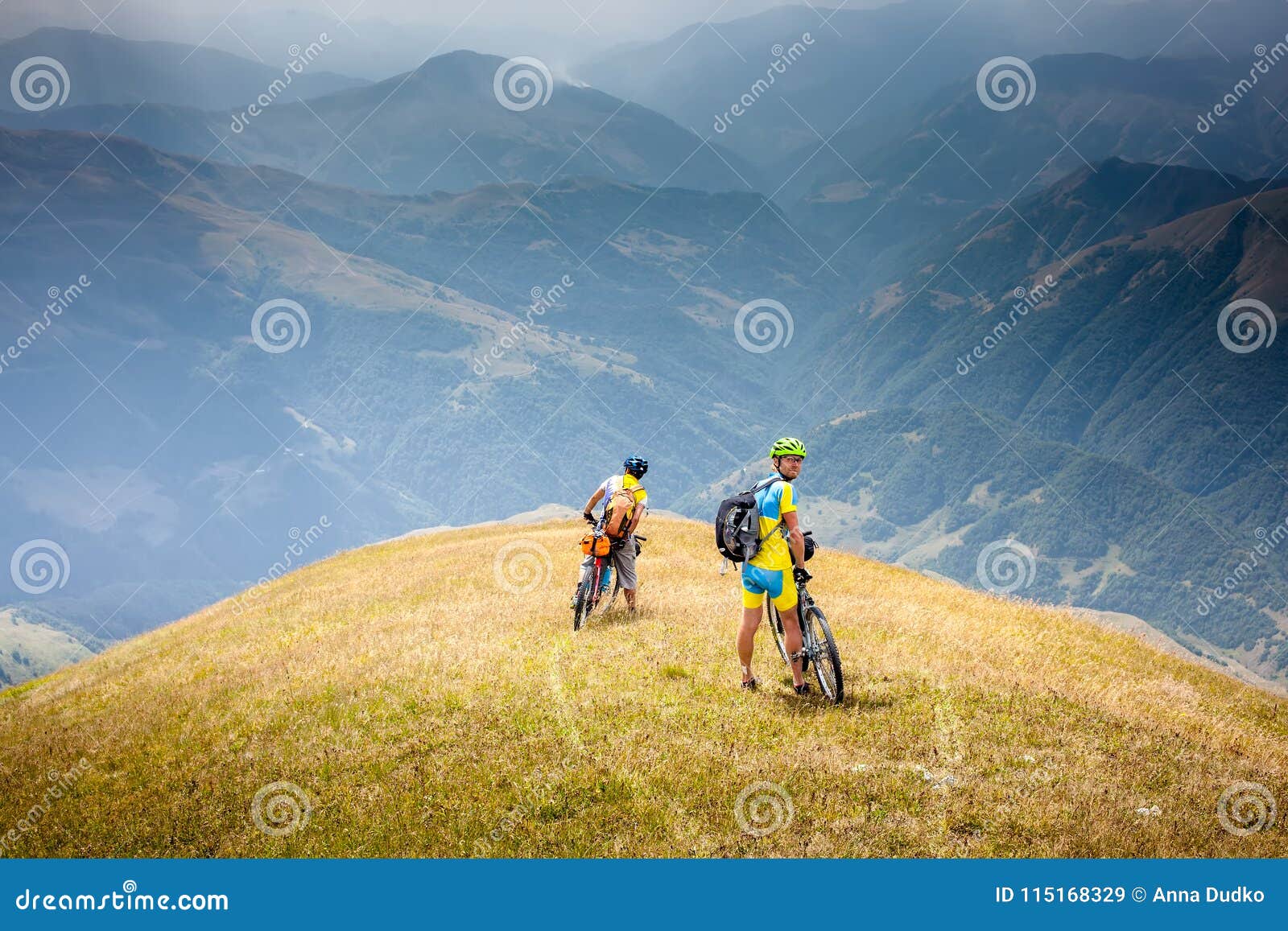 Cyclists Rest in the Mountains while Biking Stock Image - Image of male ...