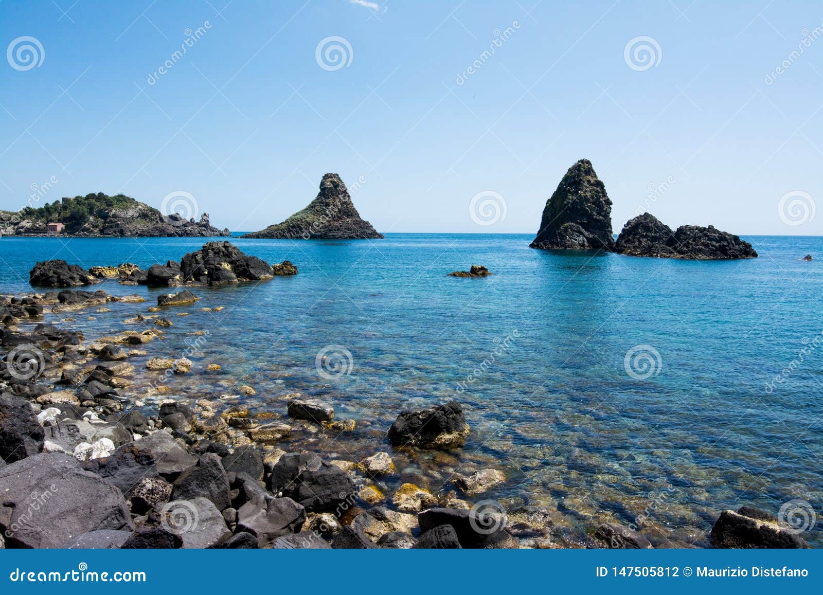 Cyclops Islands, Acitrezza, Sicily. Basalt Rocks on the Sea Stock Photo ...