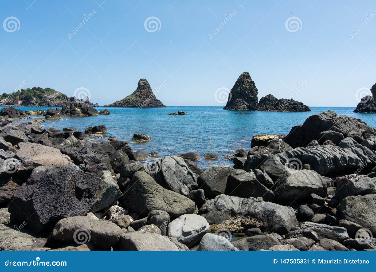 Cyclops Islands, Acitrezza, Sicily. Basalt Rocks on the Sea Stock Image ...
