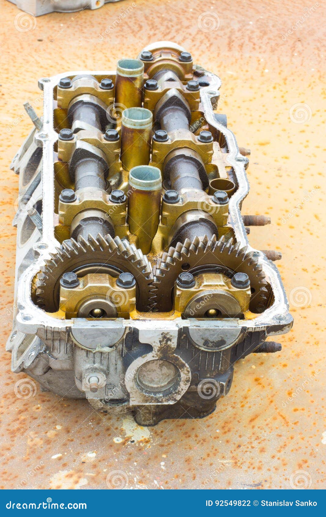 Cylinder head on rusty stock photo. Image of industrial - 92549822