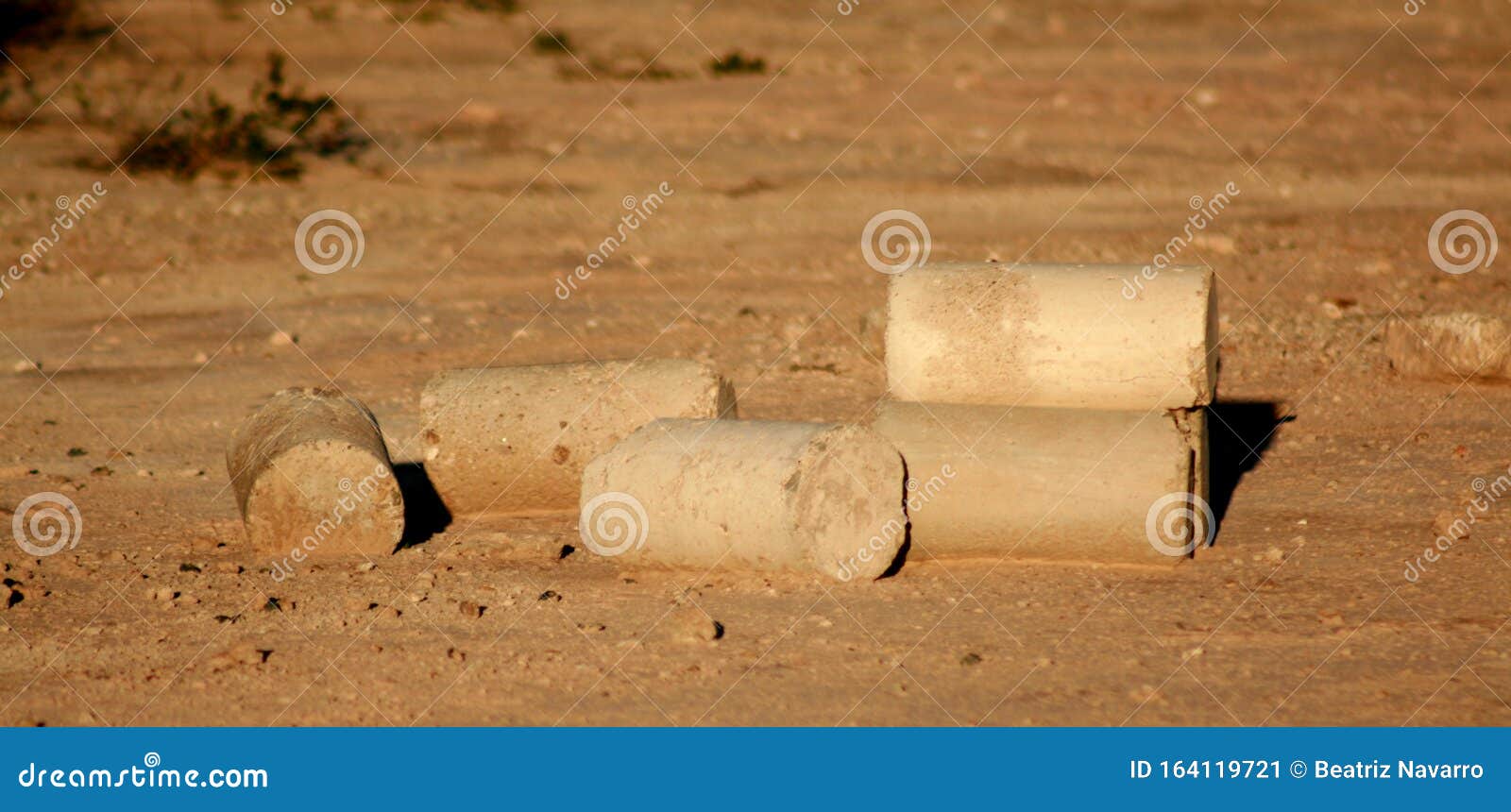 CYLINDRICAL WHITE SHAPE STONES Stock Image - Image of ground ...