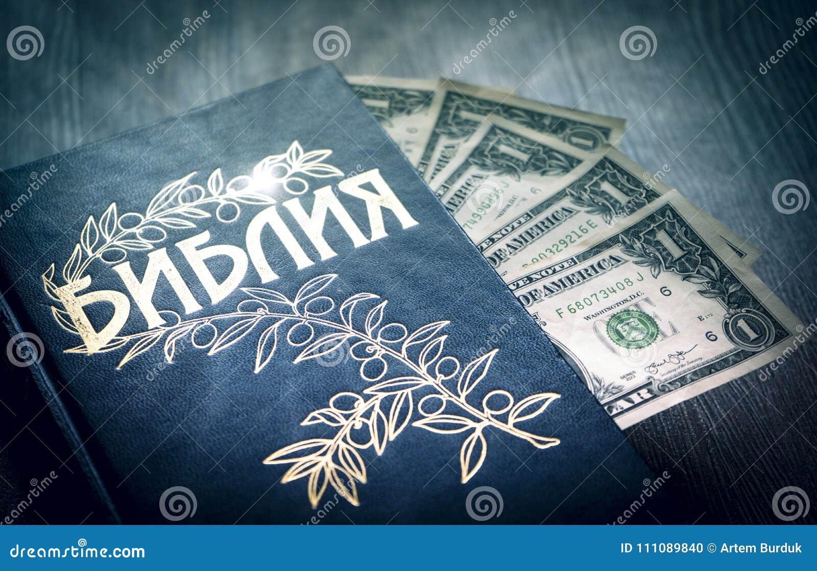Cyrillic Holy Bible with Money Dollars Stock Photo - Image of ...