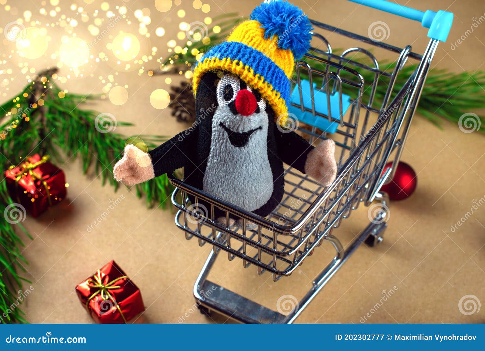 Czech Mole Doll in Shopping Cart with Christmas Decorations Stock Image ...