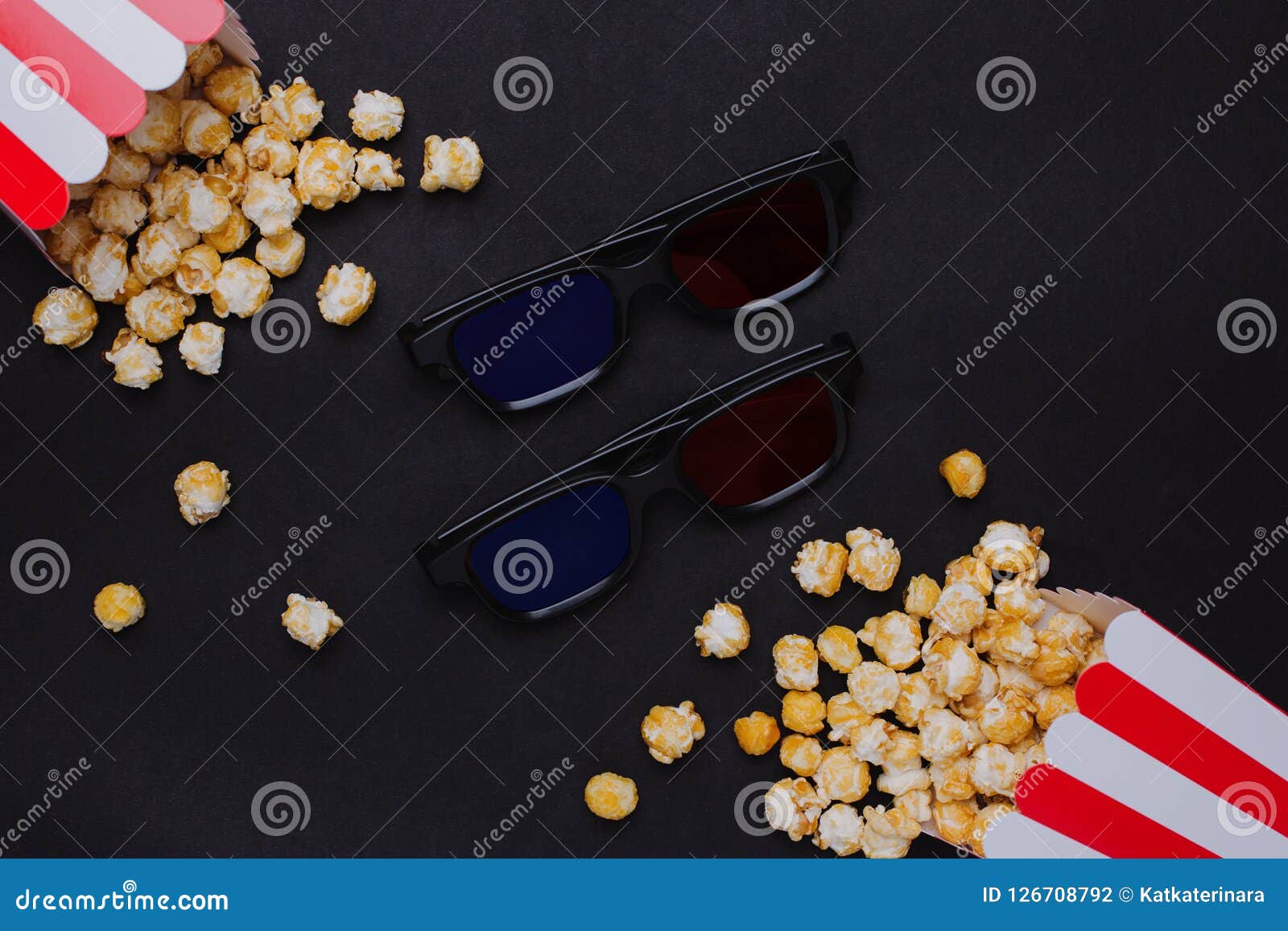 3D Glasses and Popcorn with Keyboard on a Black Background Top View ...