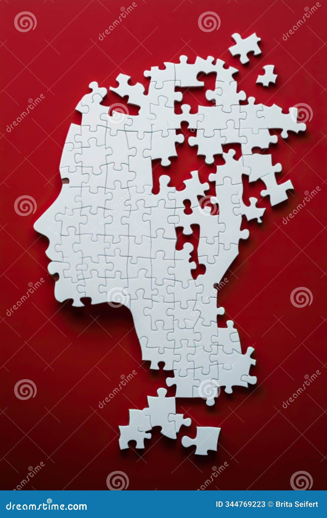 2D Human Head from Puzzle Pieces, White Puzzle Pieces on Dark Cayenne ...