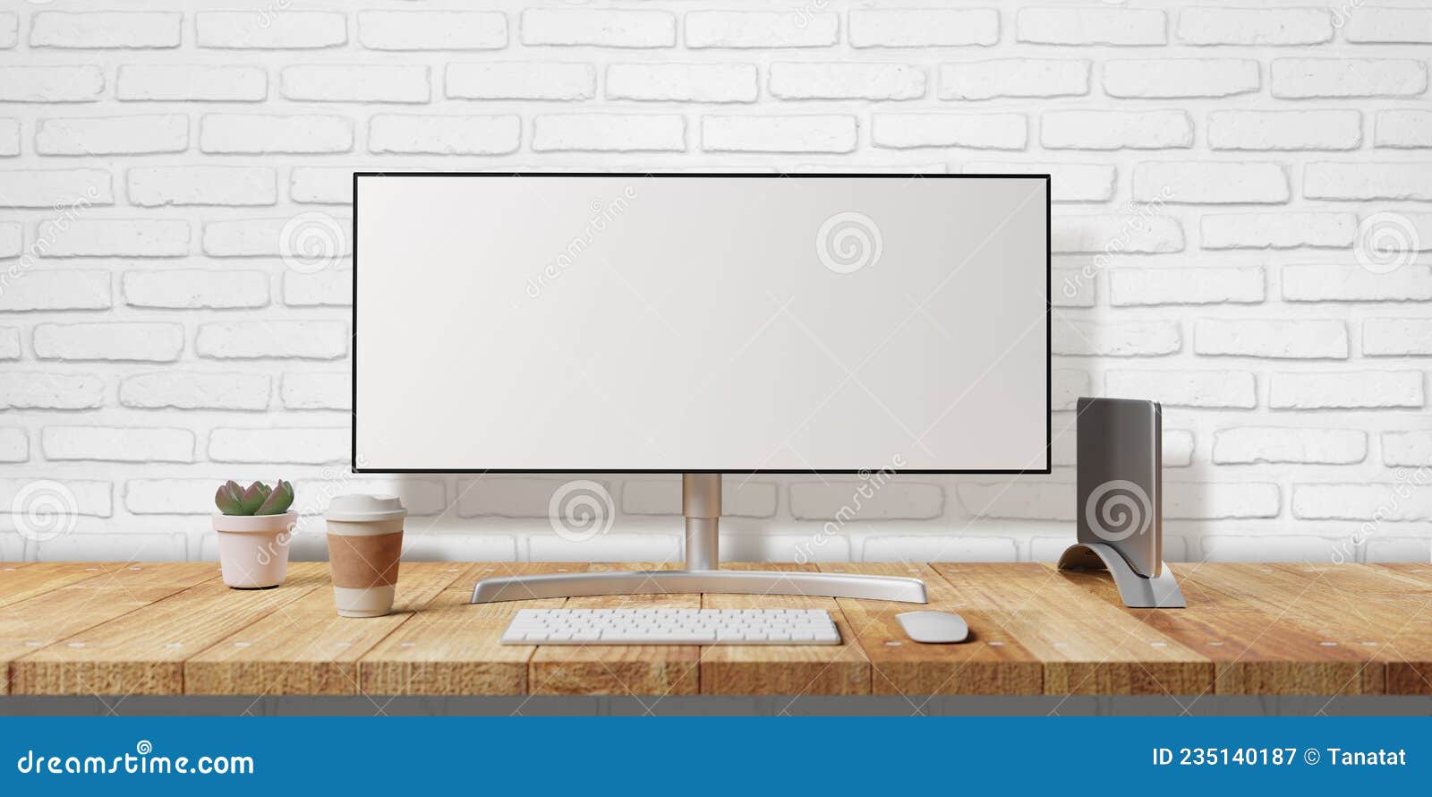 Modern Computer on Wood Table with White Bricks Wall Background Stock ...