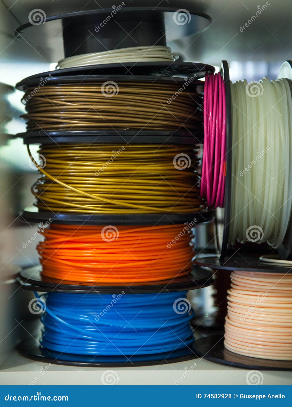 Plastic Filament In A Coil For A 3D Printer And The Red Letters ...