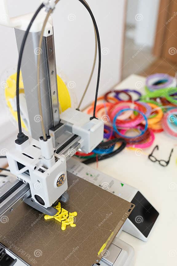 A 3D Printer Creates Objects with Colorful Bands and Innovative Designs ...