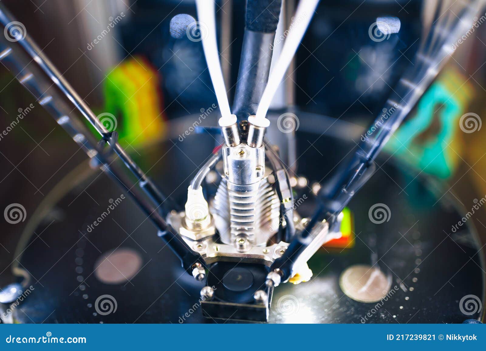 3d printer head in action stock image. Image of green - 217239821
