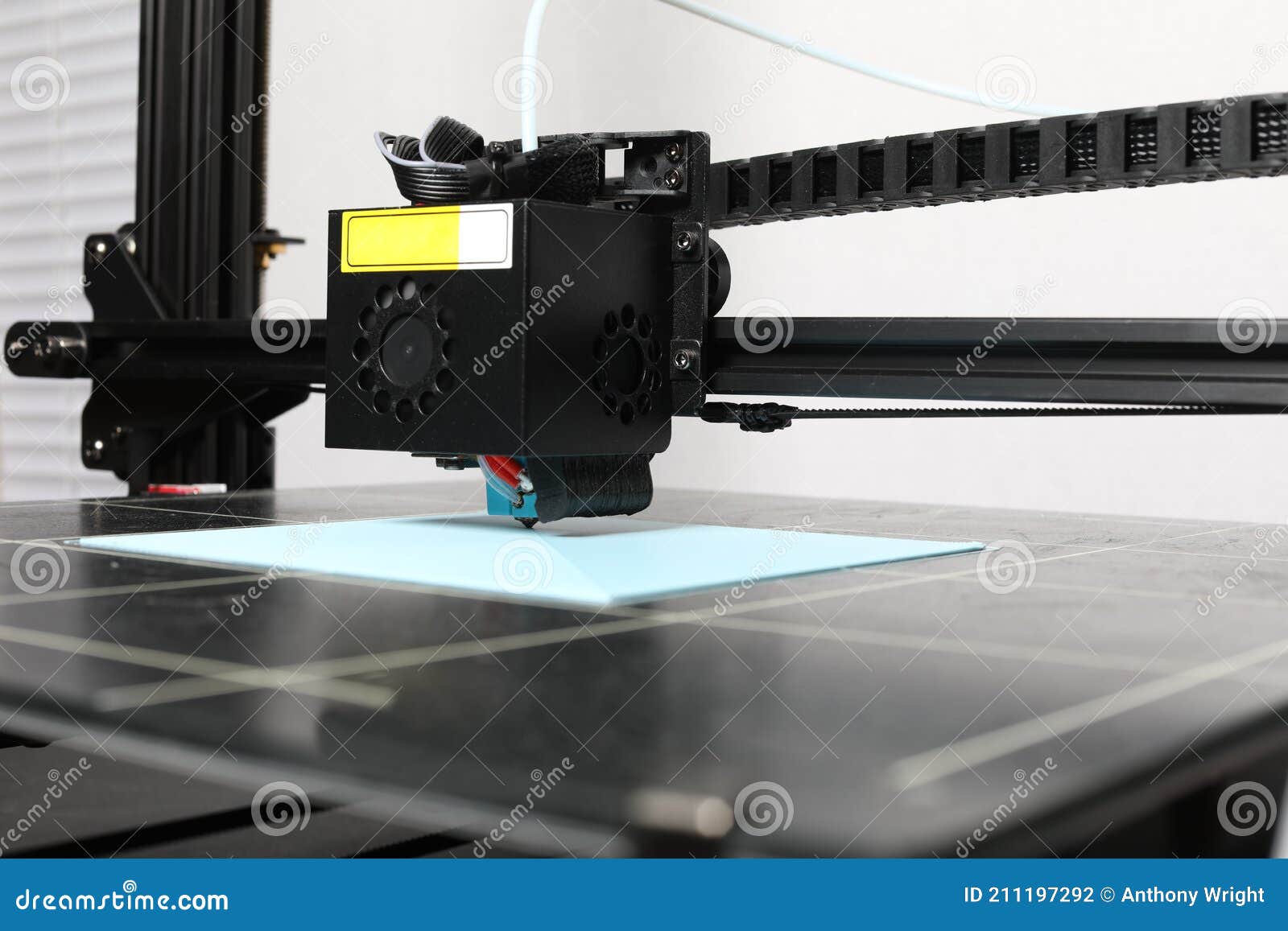 3D Printer Printing on a Grid Surface Stock Photo - Image of closeup ...