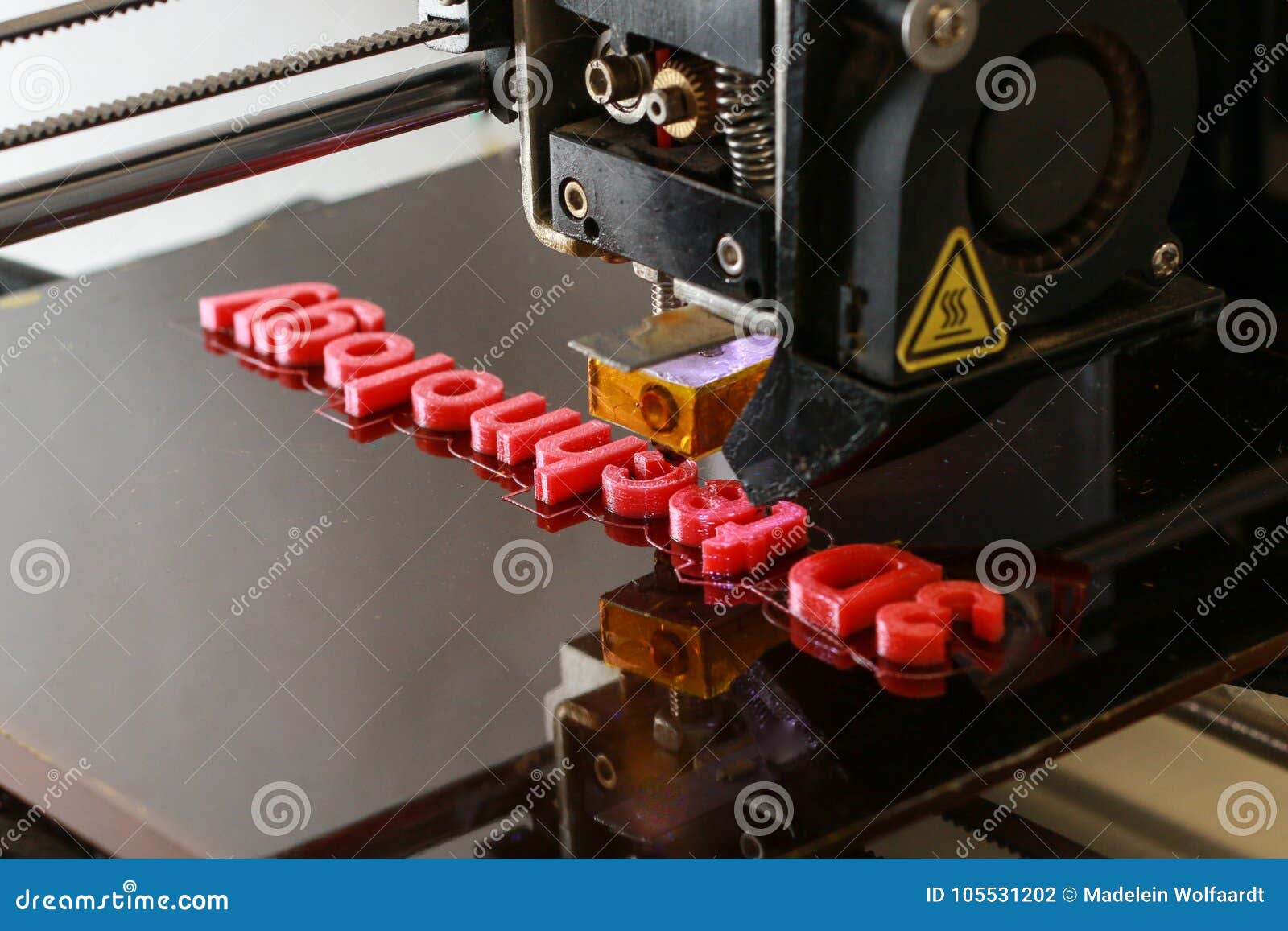 3D Printer Printing Words with Red Plastic Stock Photo - Image of ...