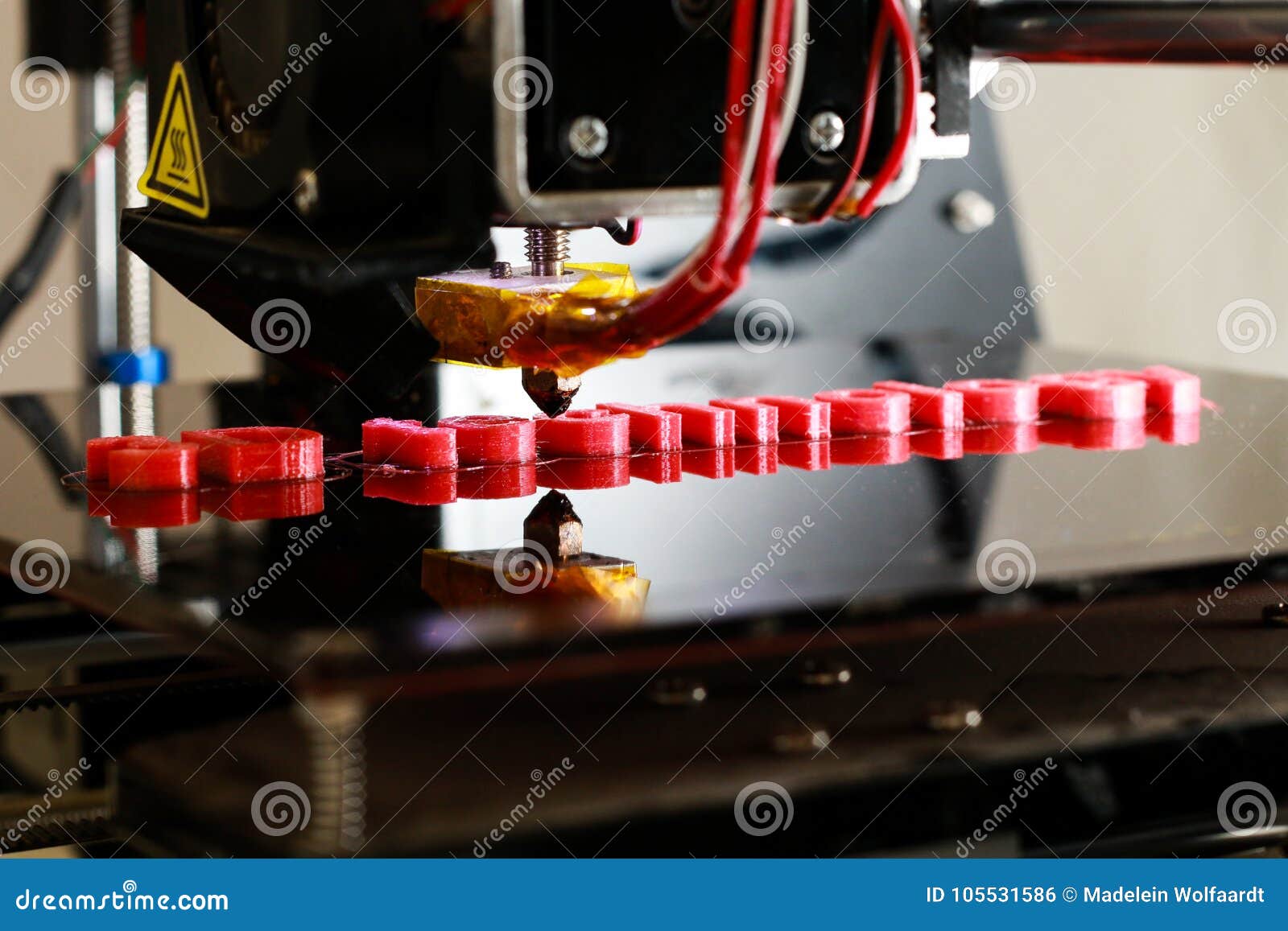 3D Printer Printing Words with Red Plastic Stock Photo - Image of ...