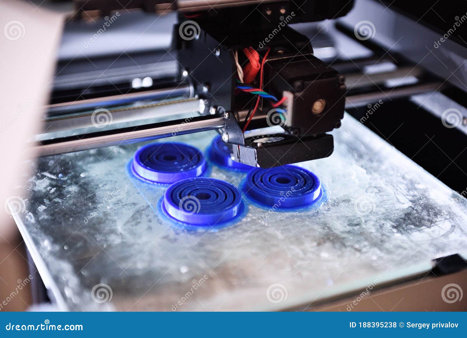 The 3D Printer Prints the Details of the Blue Plastic. Stock Photo ...