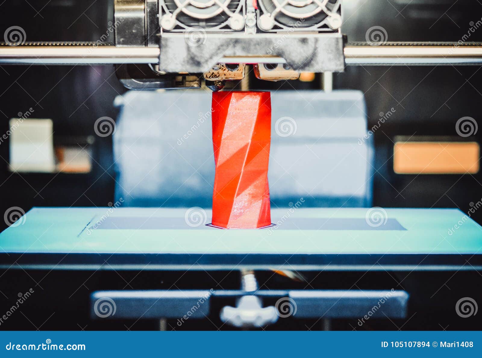 3D Printer Works and Creates an Object from the Hot Molten Plastic ...