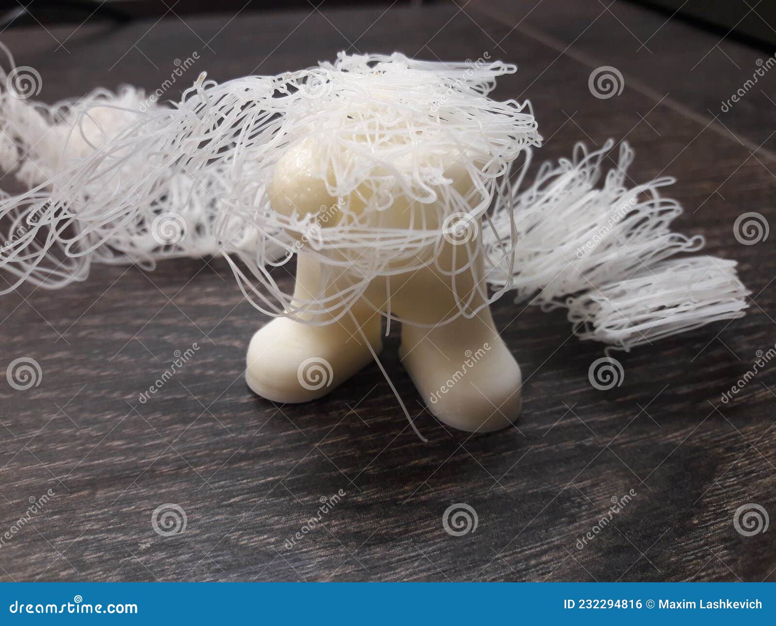 3D Printing Gone Wrong - Legs of a Figure and Plastic Mess Stock Photo ...
