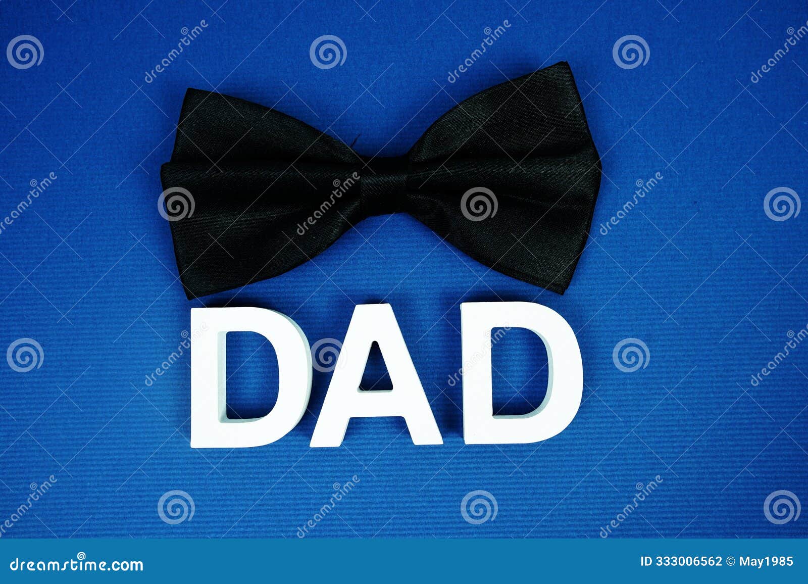 DAD Alphabet Letters with Bow Tie on Navy Blue Background Stock Photo ...