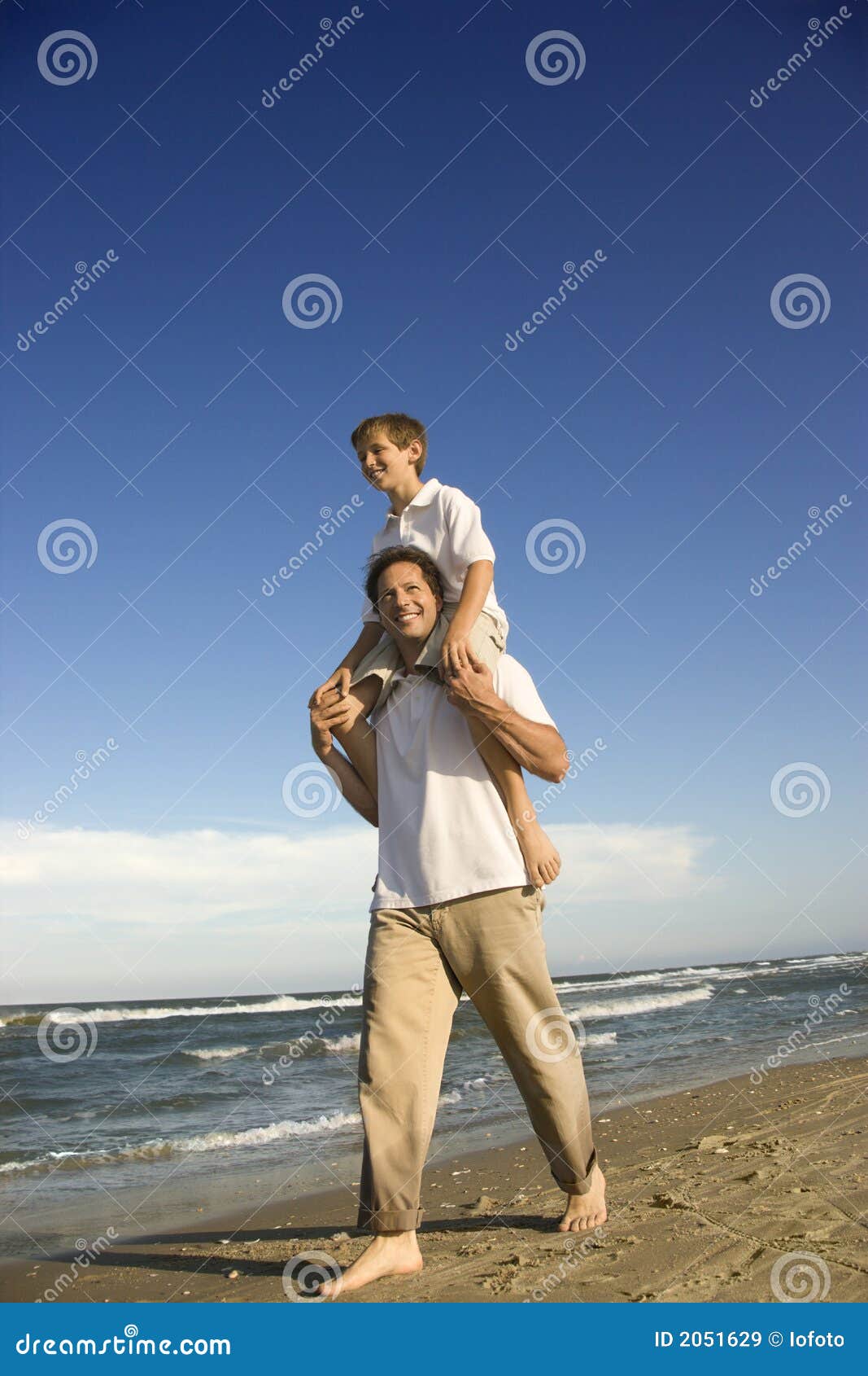 Dad carrying son stock image. Image of girl, leisure, vacation - 2051629