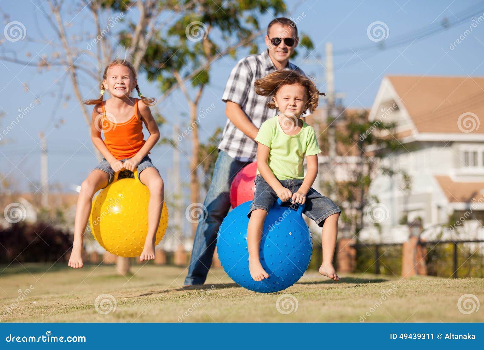 Dad and Children Playing on the Lawn Stock Image - Image of jump ...