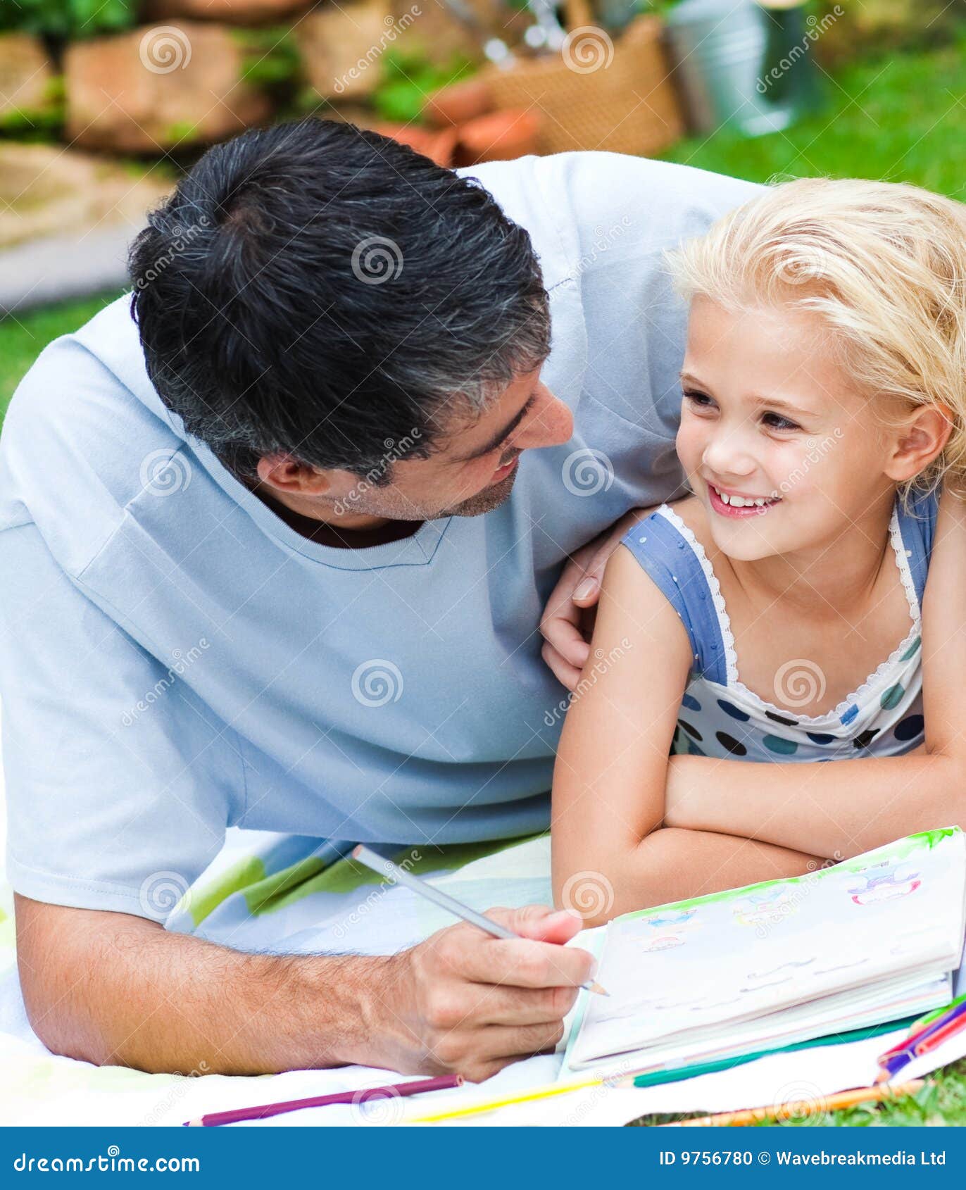 Dad and Daughter Doing Homework in a Garden Stock Photo - Image of ...