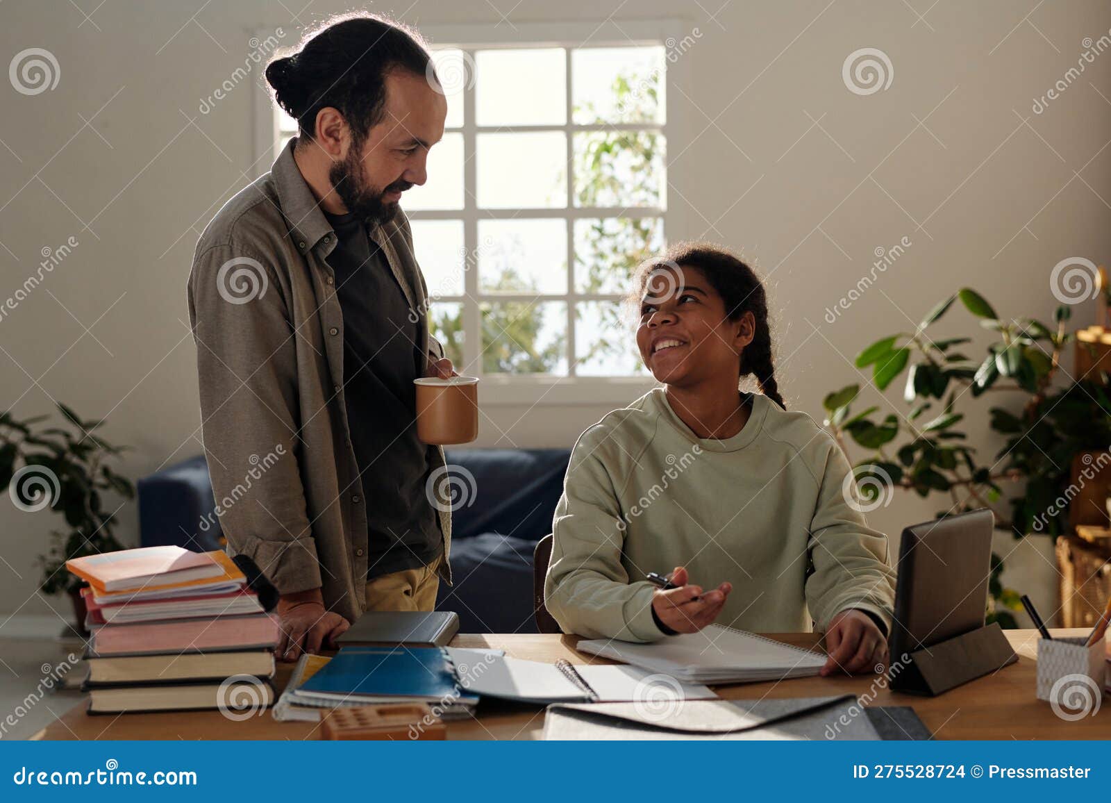 Dad Helping His Adopted Daughter with Study Stock Photo - Image of ...