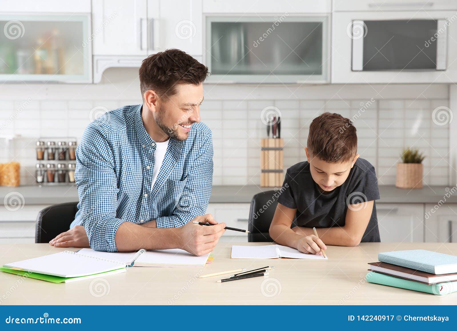 Dad Helping His Son with Homework Stock Image - Image of child, ideas ...