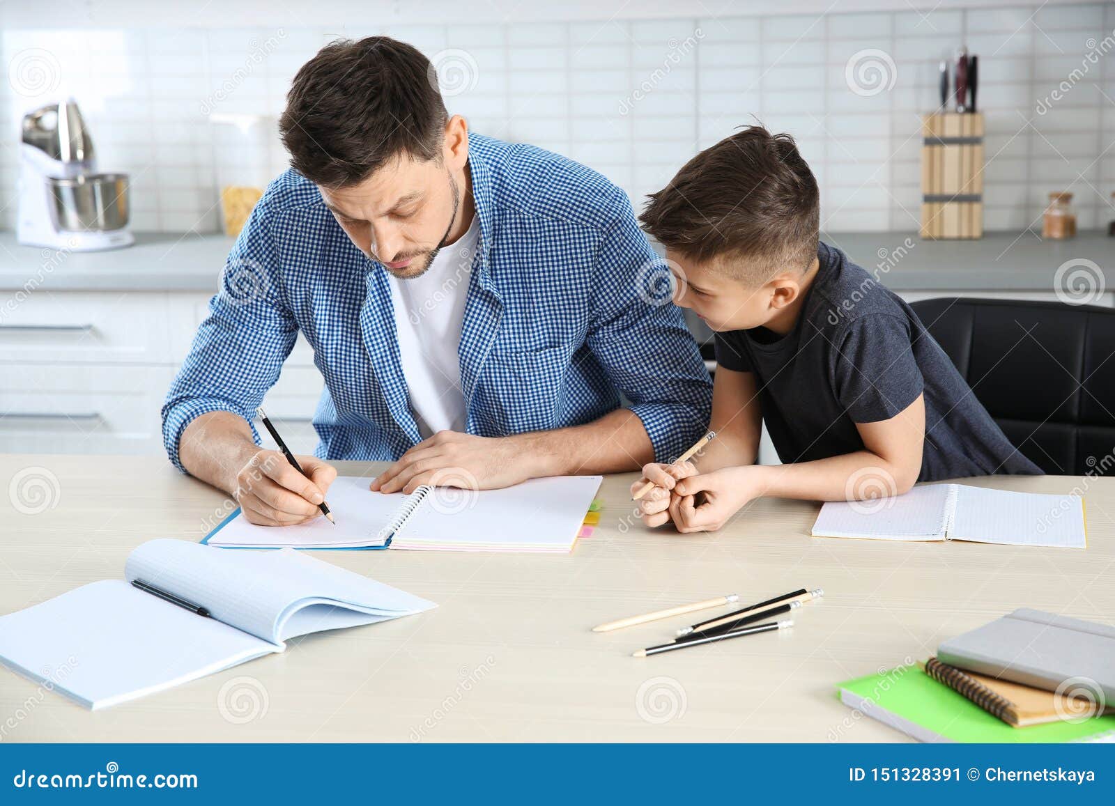 Dad Helping His Son with Homework Stock Image - Image of lesson ...