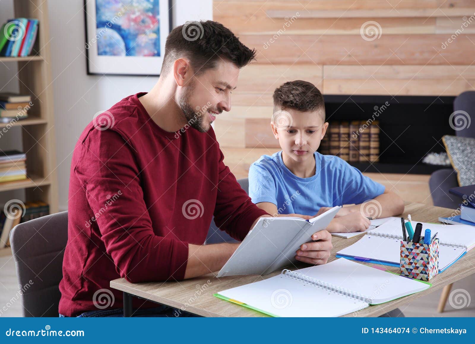 Dad Helping His Son with Homework Stock Photo - Image of caucasian ...