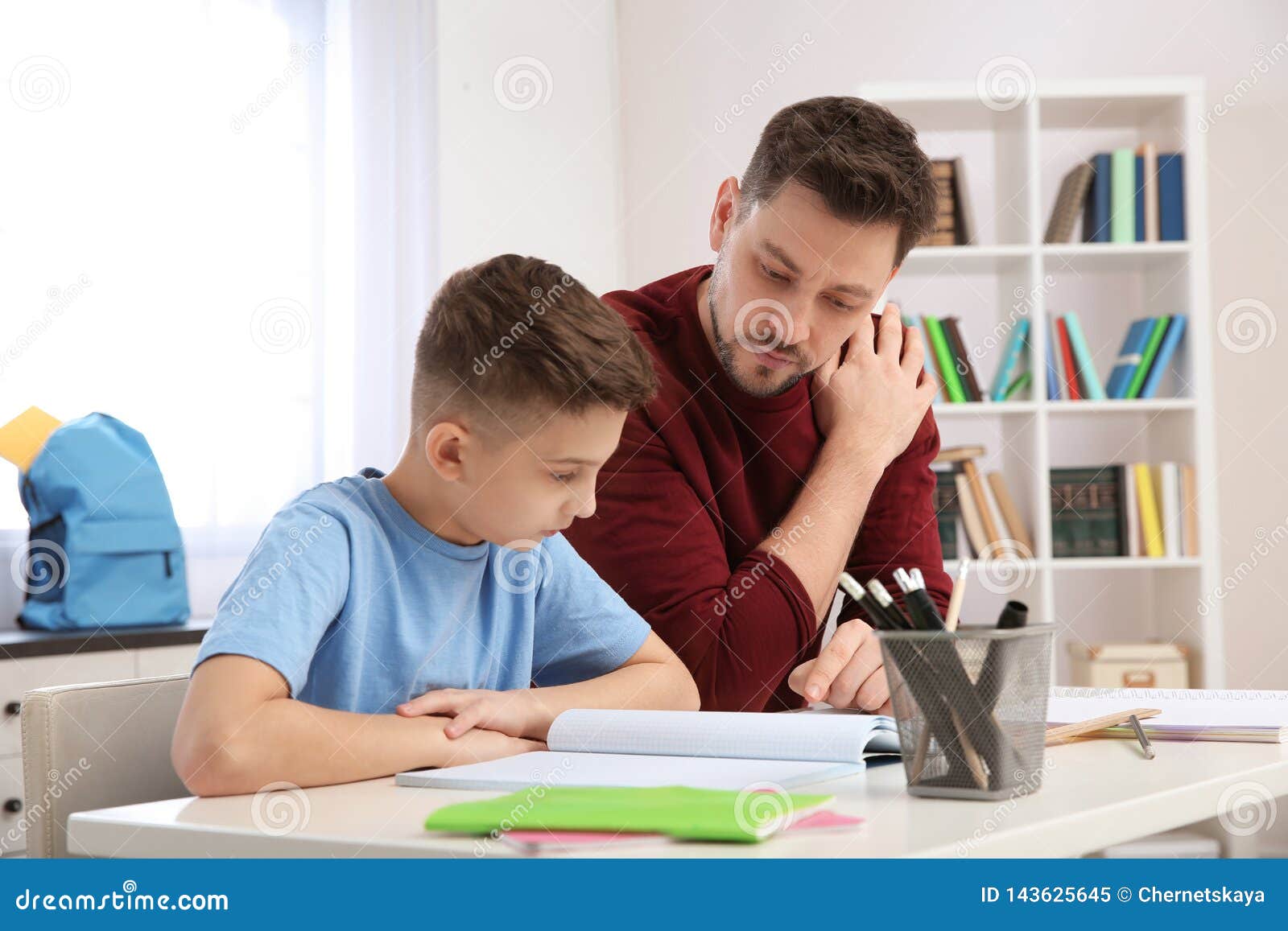 Dad Helping His Son with Homework Stock Image - Image of helping ...