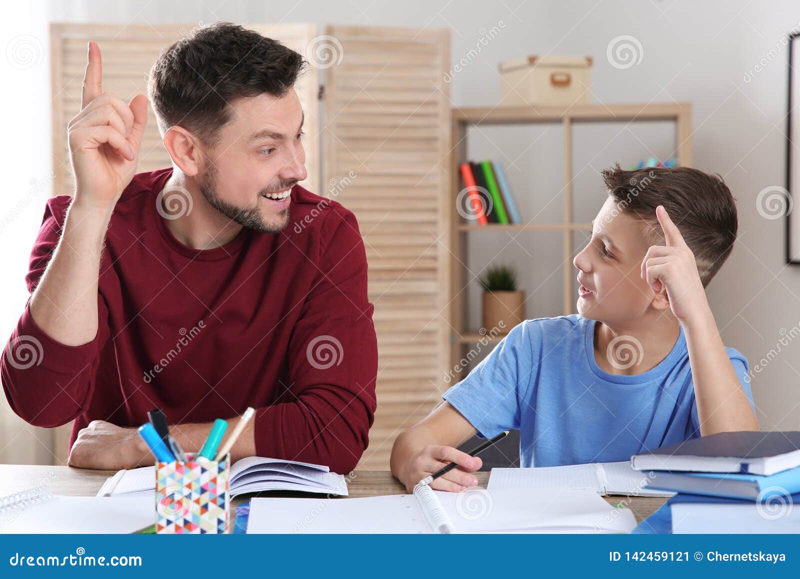 Dad Helping His Son with Homework Stock Image - Image of adult, father ...