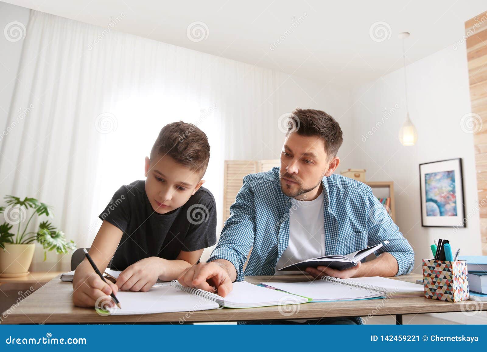 Dad Helping His Son with Homework Stock Image - Image of help ...
