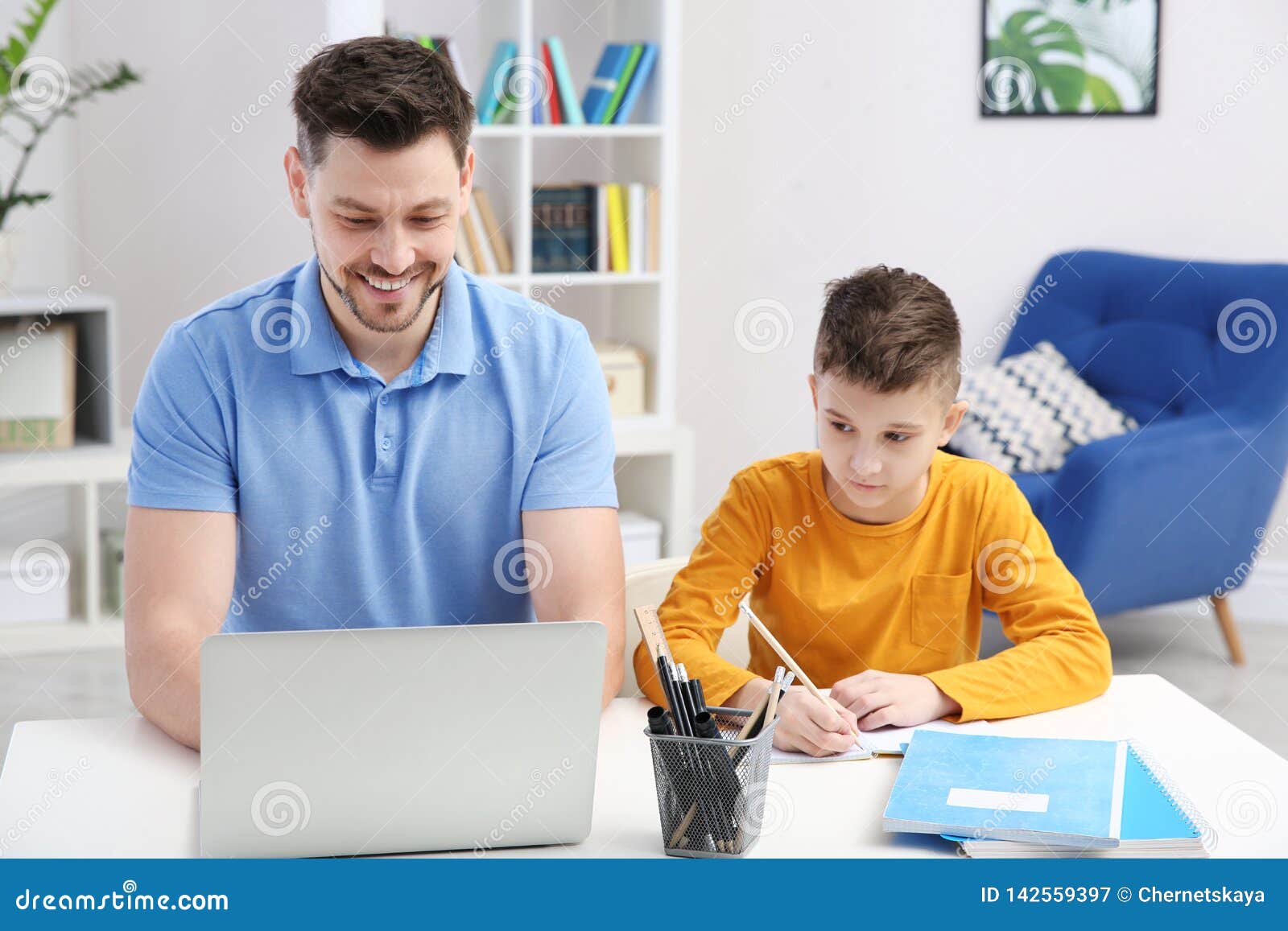 Dad Helping His Son with Homework Stock Image - Image of exercise ...