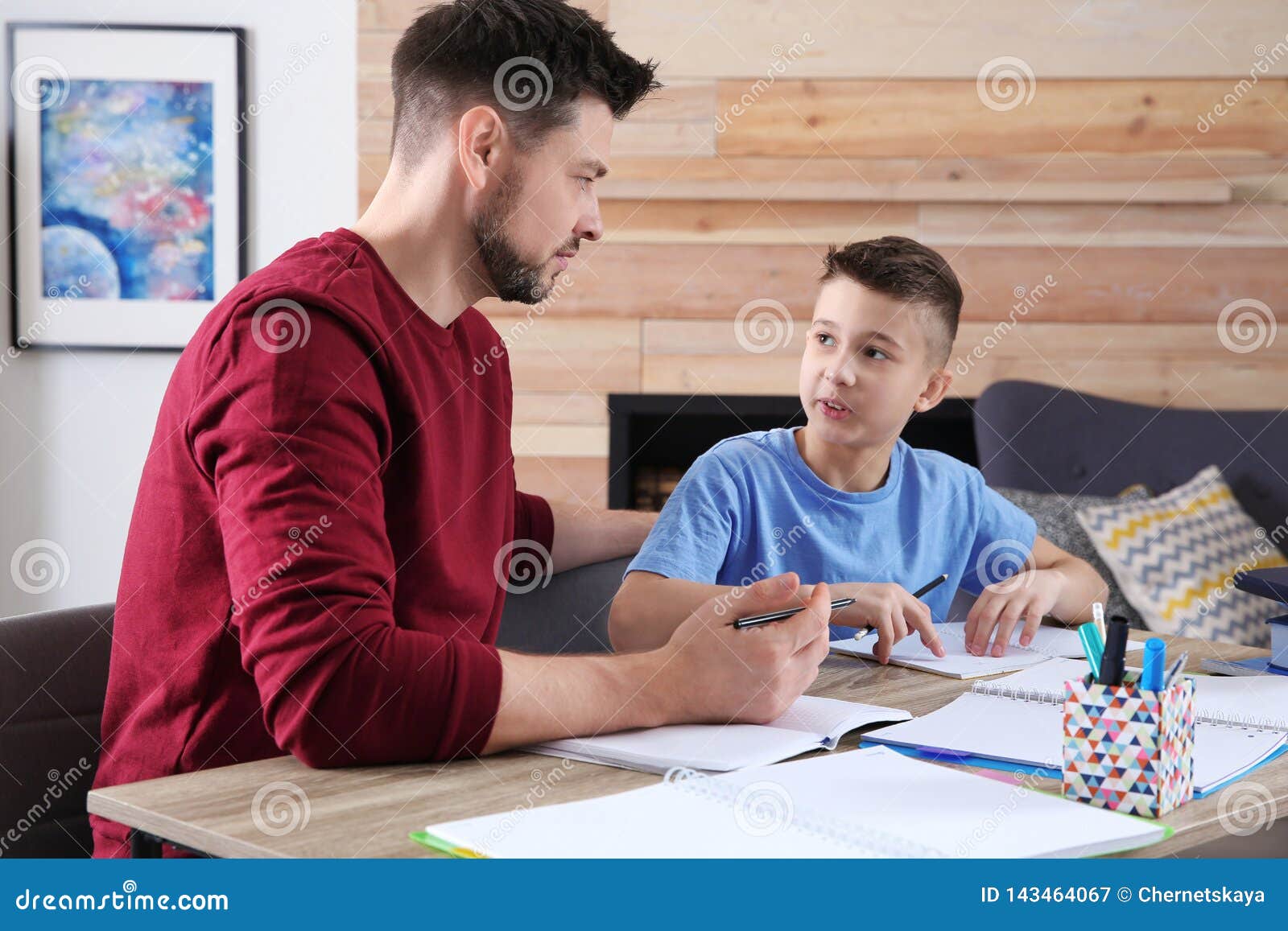 Dad Helping His Son with Homework Stock Image - Image of child, family ...