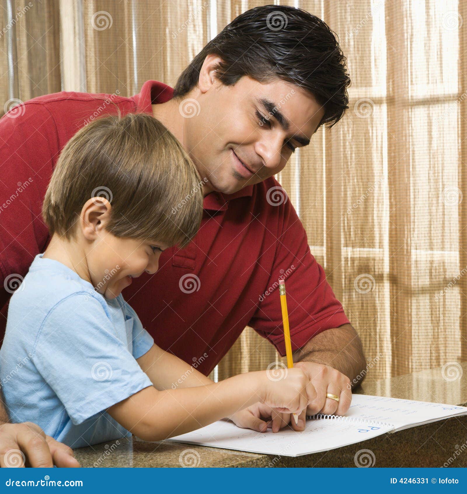 Dad helping son. stock image. Image of adult, indoors - 4246331