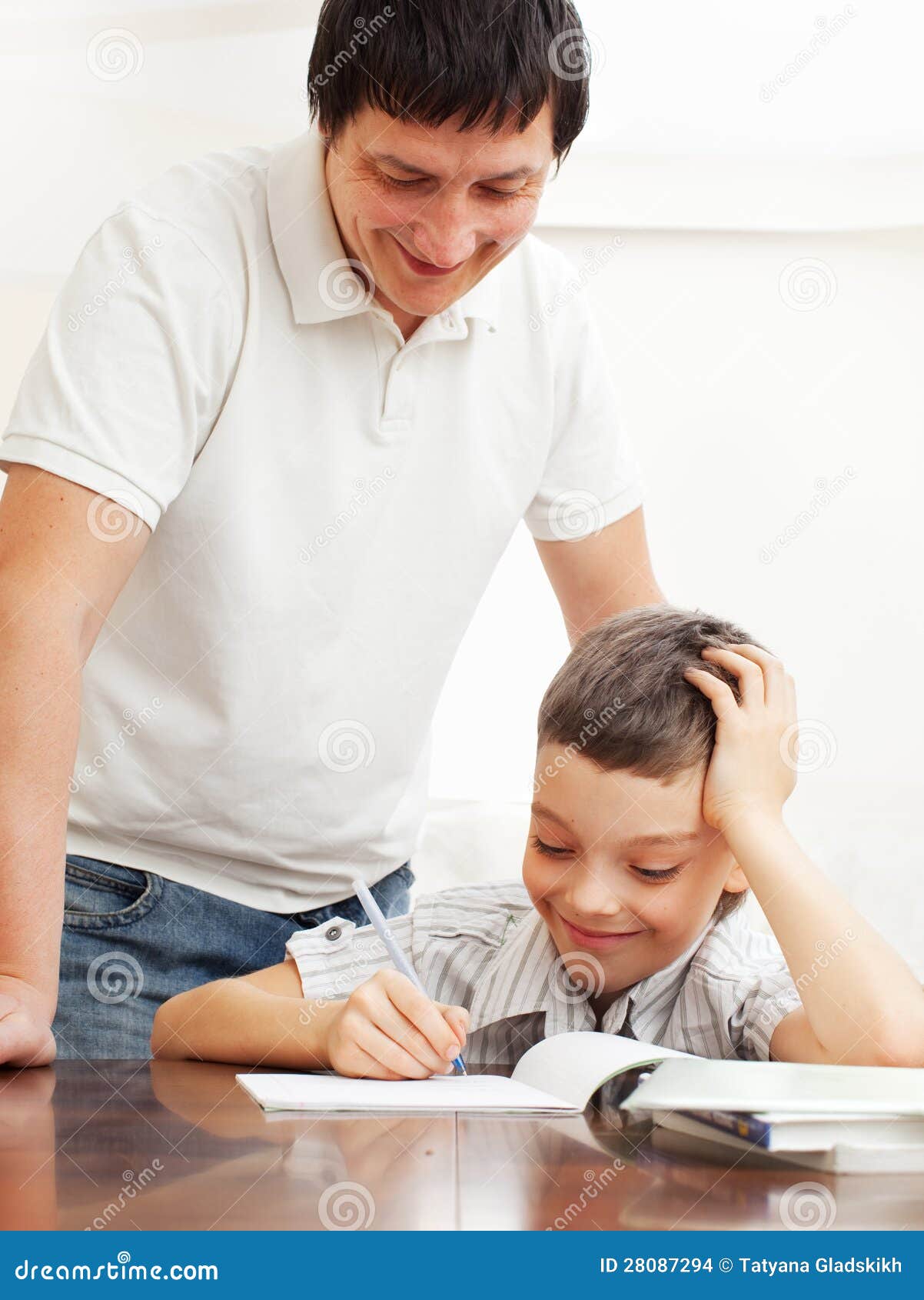 Dad Helping Son Do Homework Stock Photo - Image of helping, learn: 28087294