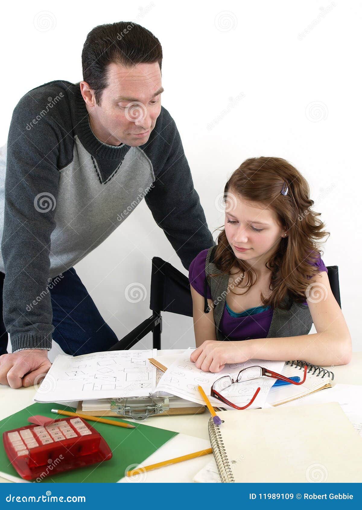 Dad helps Daughter Study stock image. Image of help, helping - 11989109