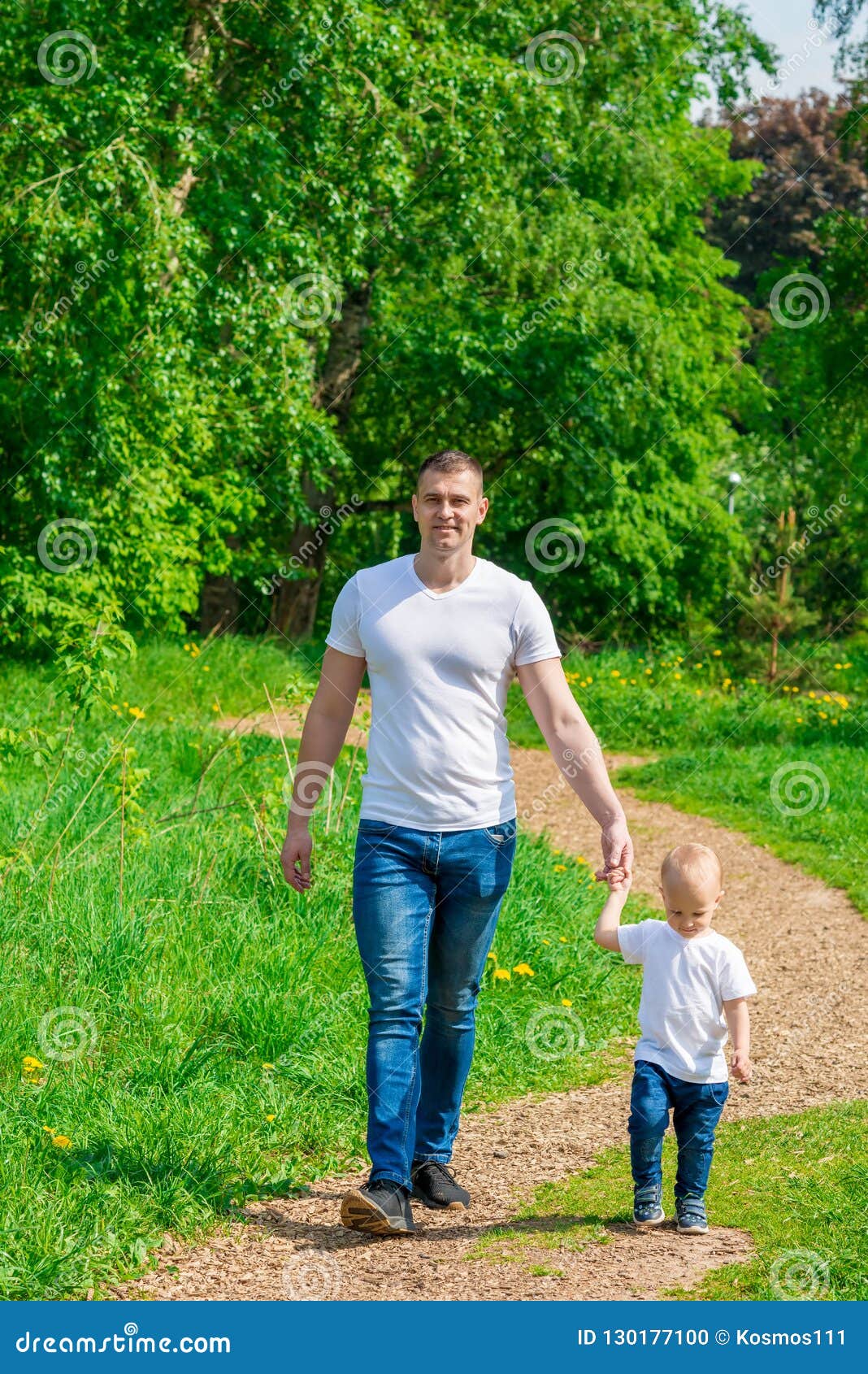 Dad with His Son for a Walk Stock Photo - Image of lawn, baby: 130177100