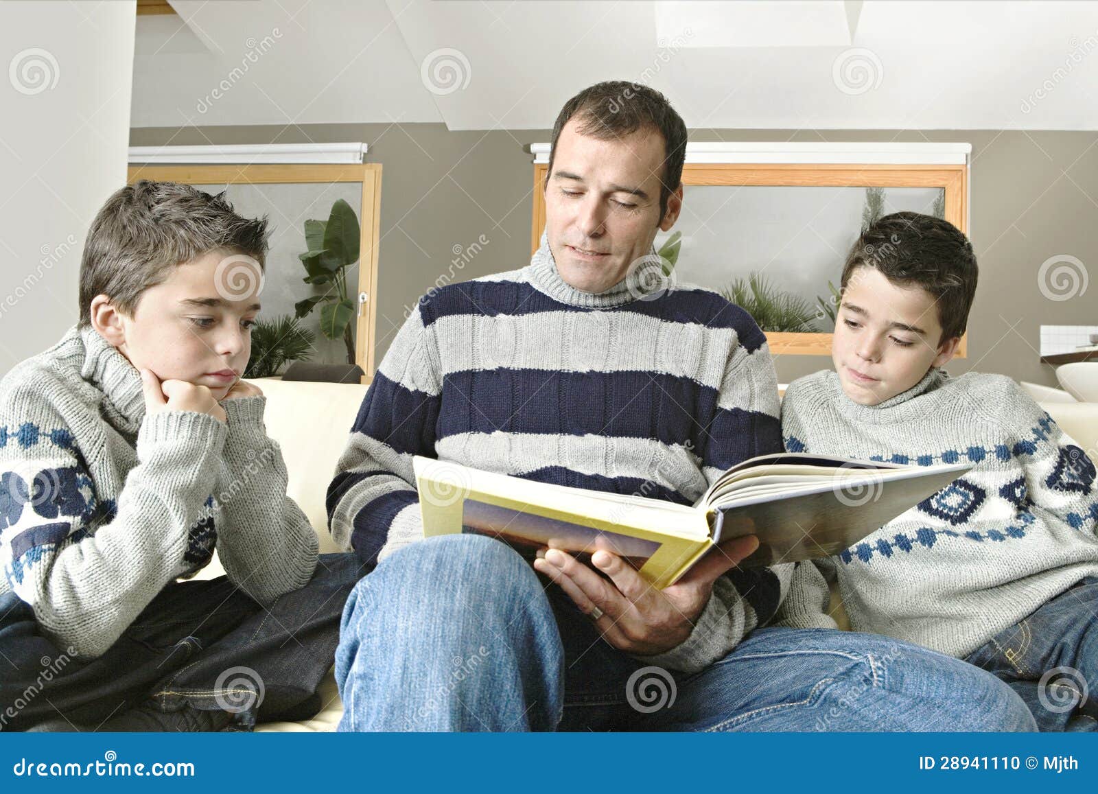 Dad and kids reading book stock photo. Image of hispanic - 28941110